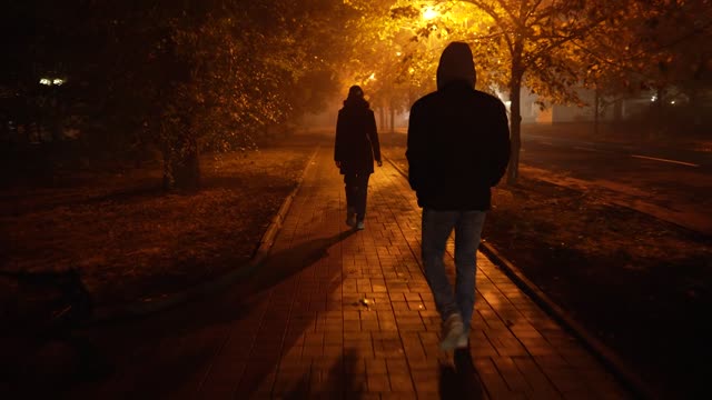 Man Stalking Woman Stock Footage: Royalty-Free Video Clips - Storyblocks