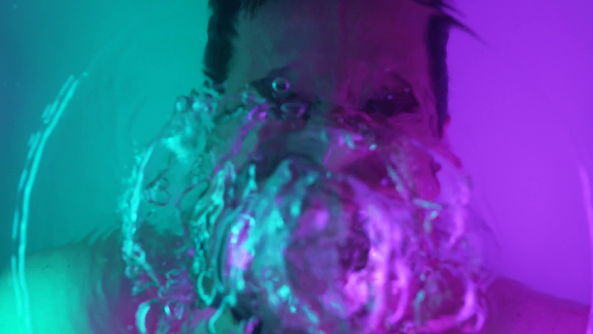 Man Screaming Submerged In Neon Water Stock Footage SBV-352368583 ...
