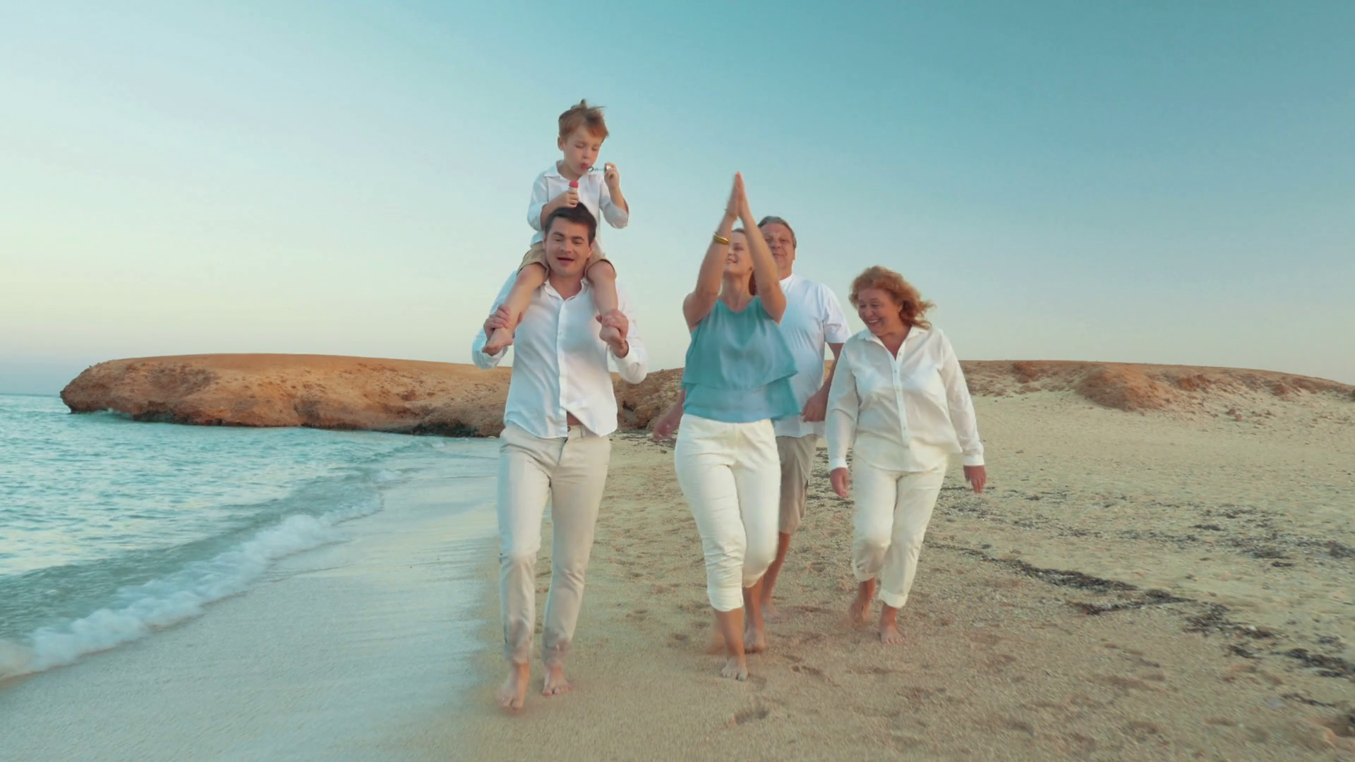 Steadicam Shot Of Happy Barefoot Family Stock Footage SBV-338010980 ...