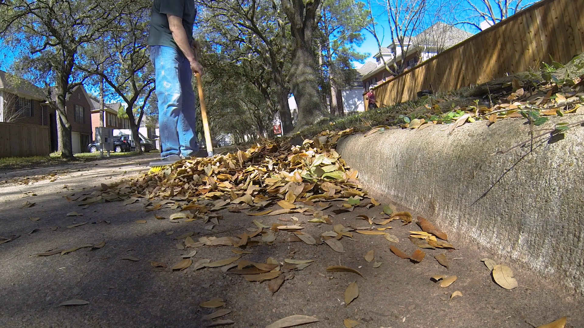 Man Sweeping Leaves Part Of Yard Work Stock Footage SBV-351893147 ...