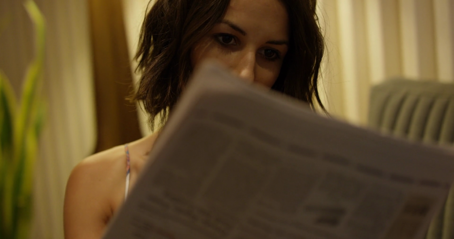 Young Woman Reads Newspaper In Straight-on Stock Footage SBV-347707397 ...