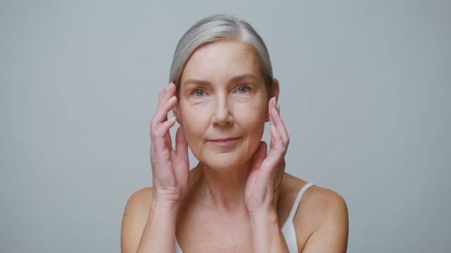 Middle Age Woman Looking At Camera Stock Footage: Royalty-Free Video ...