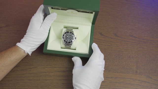 Clip Of Someone Opening A Rolex Box At A Store POV Shot Stock Footage ...