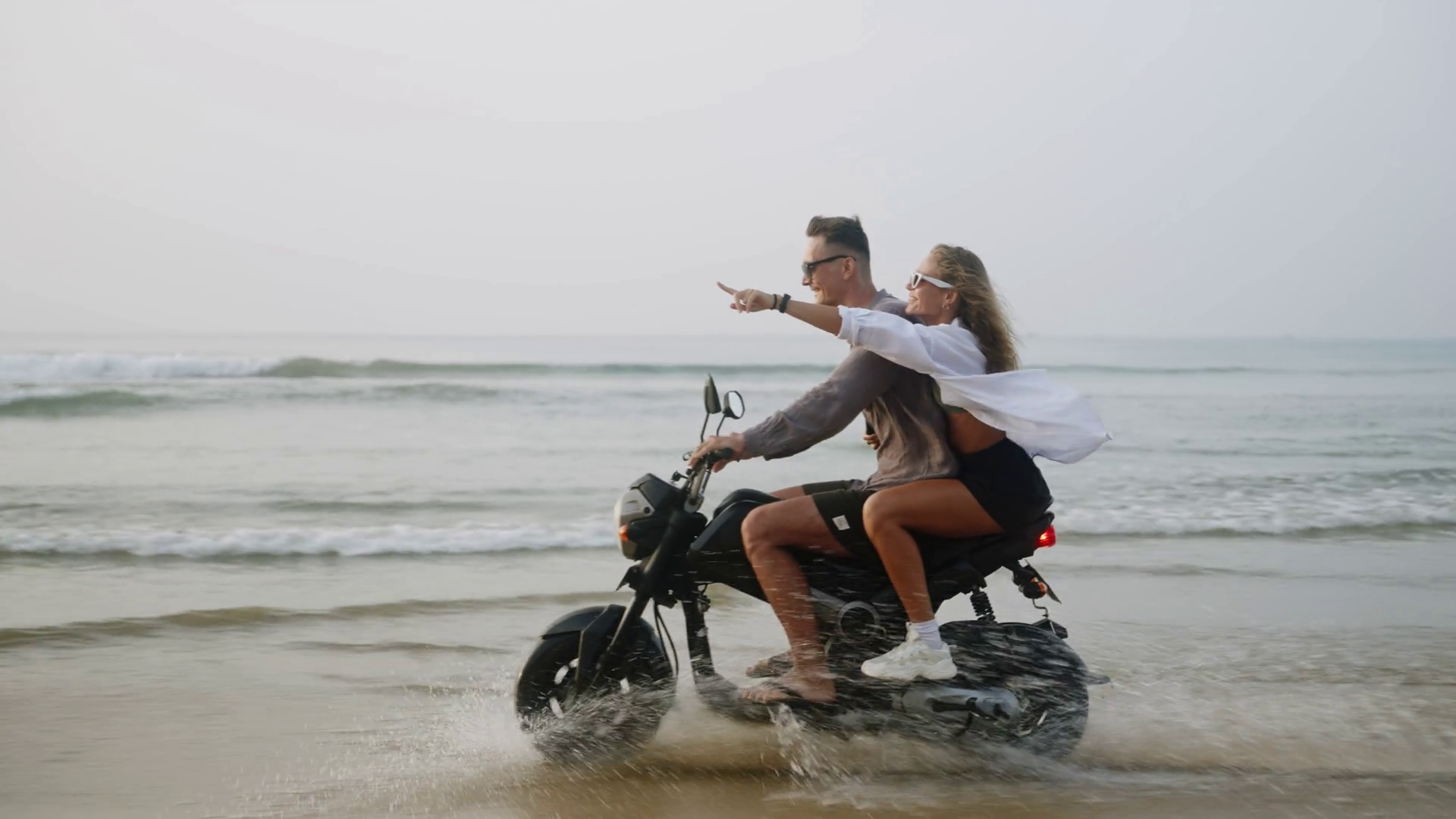 Young Couple Ride Motorcycle Splashing Water Stock Footage SBV ...