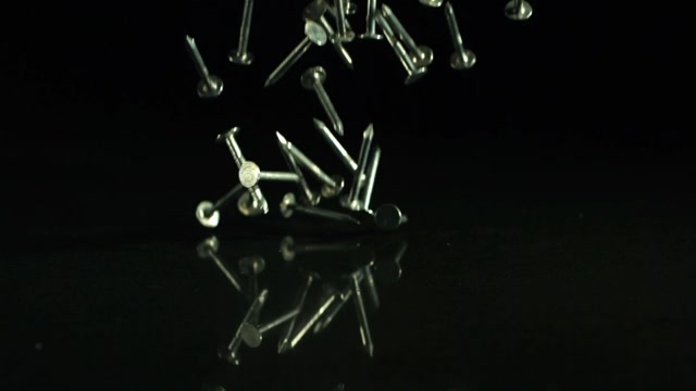 Falling Nails Stock Footage: Royalty-Free Video Clips - Storyblocks