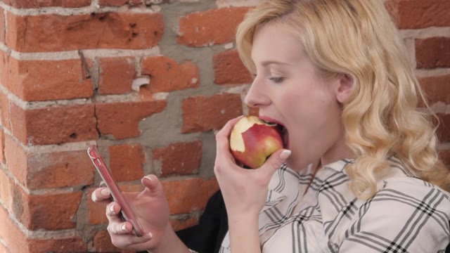 Eating Apple Stock Footage: Royalty-Free Video Clips - Storyblocks