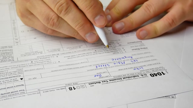 People Filing Forms Stock Footage: Royalty-Free Video Clips - Storyblocks
