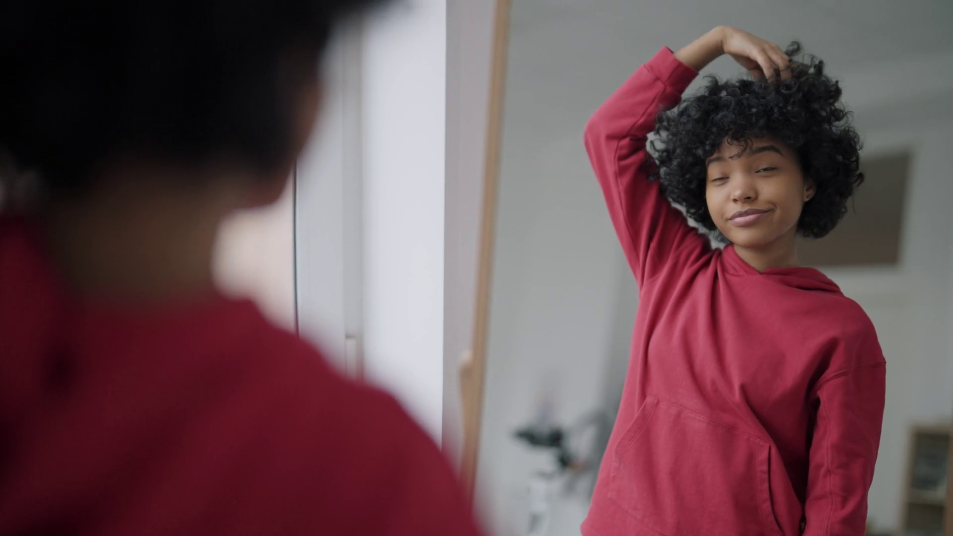 Positive Relaxed Girl Preening Curly Hair Stock Footage SBV-347664006 ...