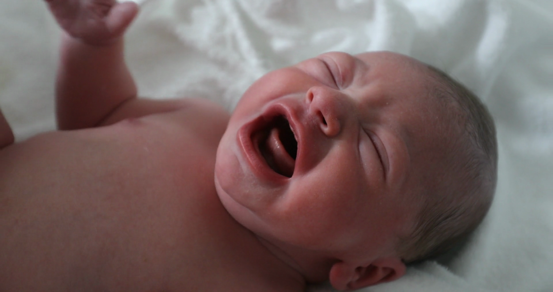 Early Expressions: Crying Newborn Baby In Stock Footage SBV-348433274 ...