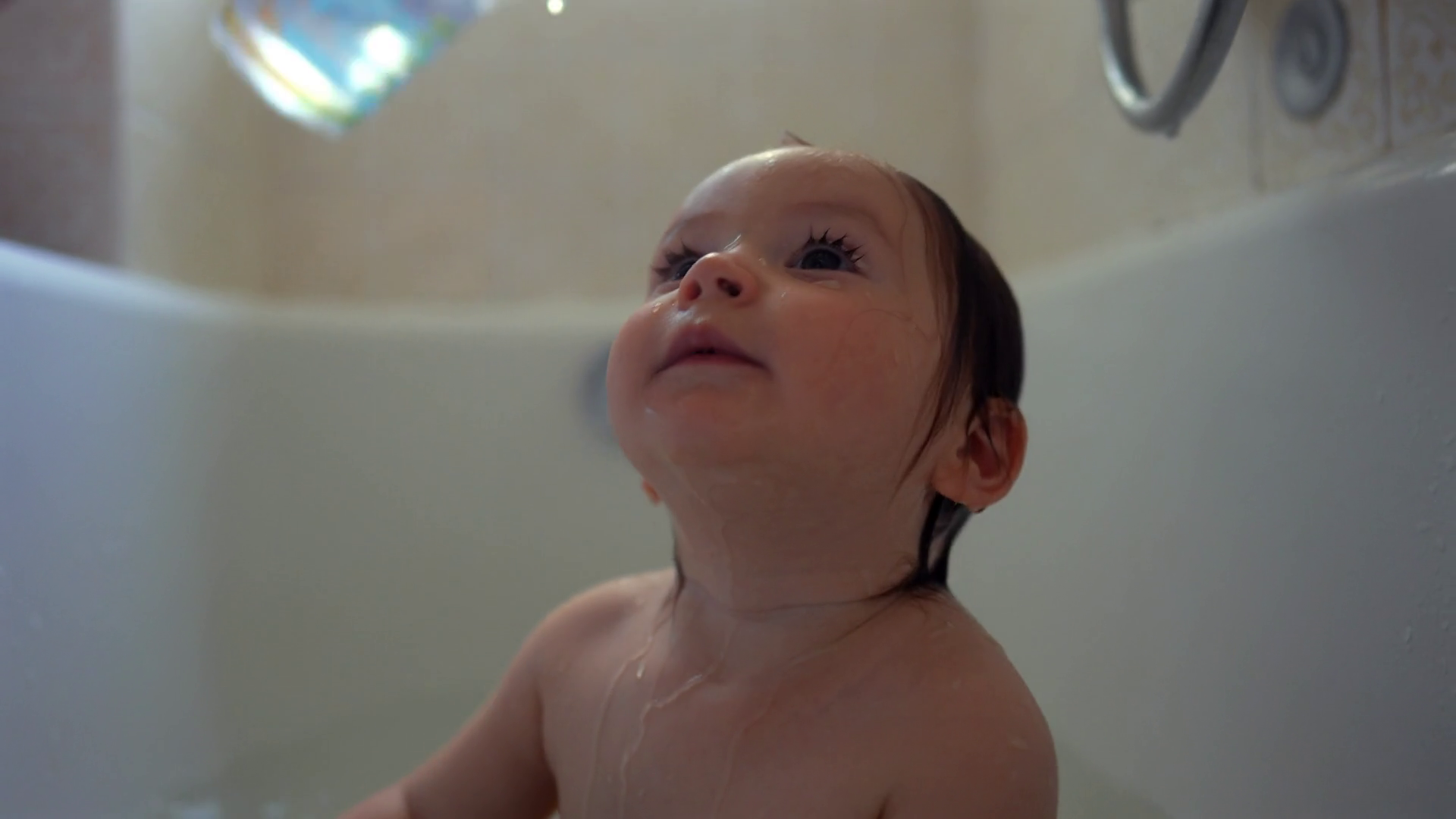 Baby Sitting In Bathtub Looking Up With Soft Stock Footage SBV ...