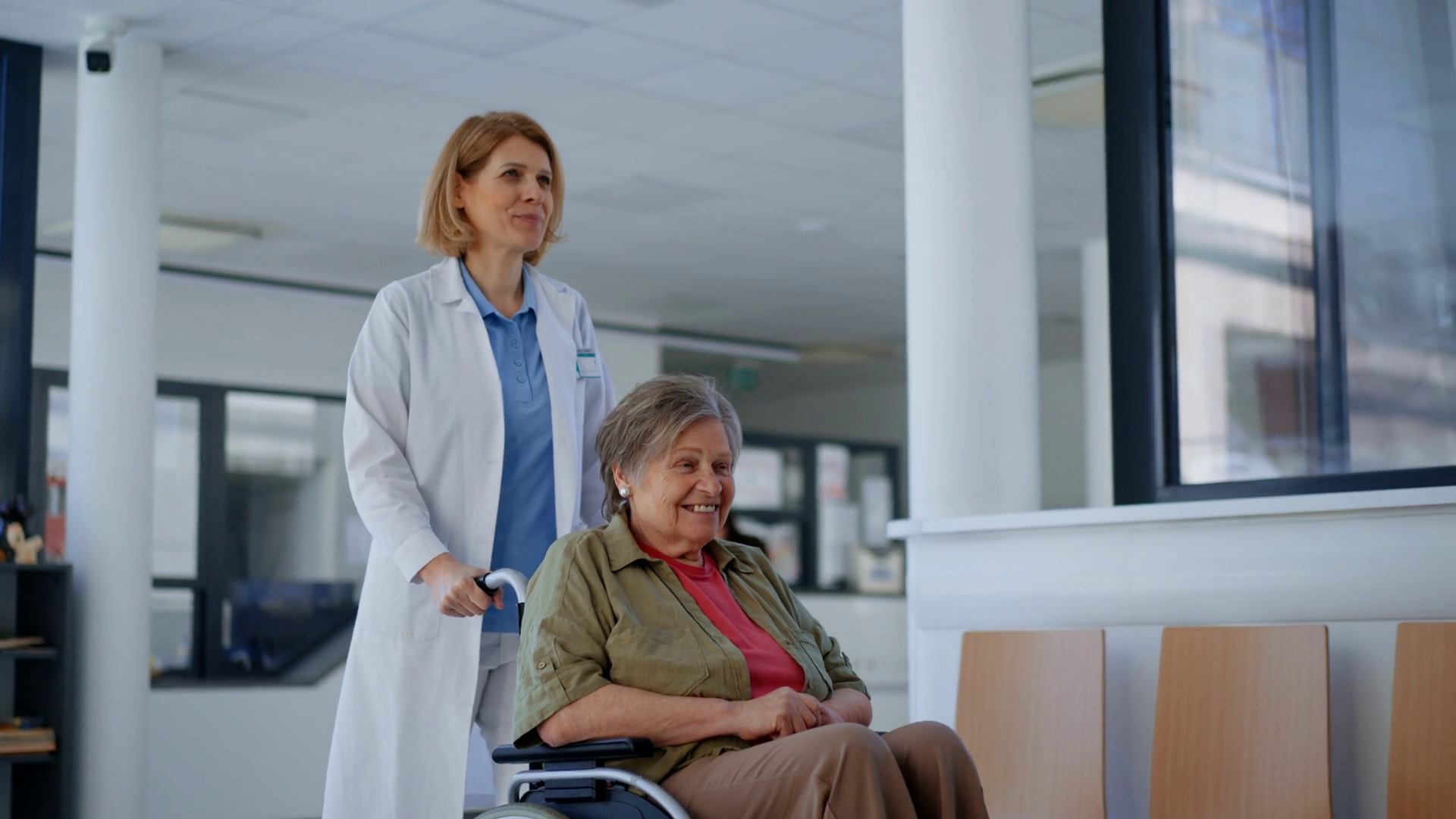 Friendly Doctor Pushing Elderly Patient In Stock Footage SBV-352536959 ...