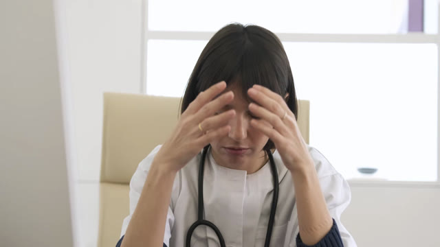 Stressed Doctor Stock Footage: Royalty-Free Video Clips - Storyblocks