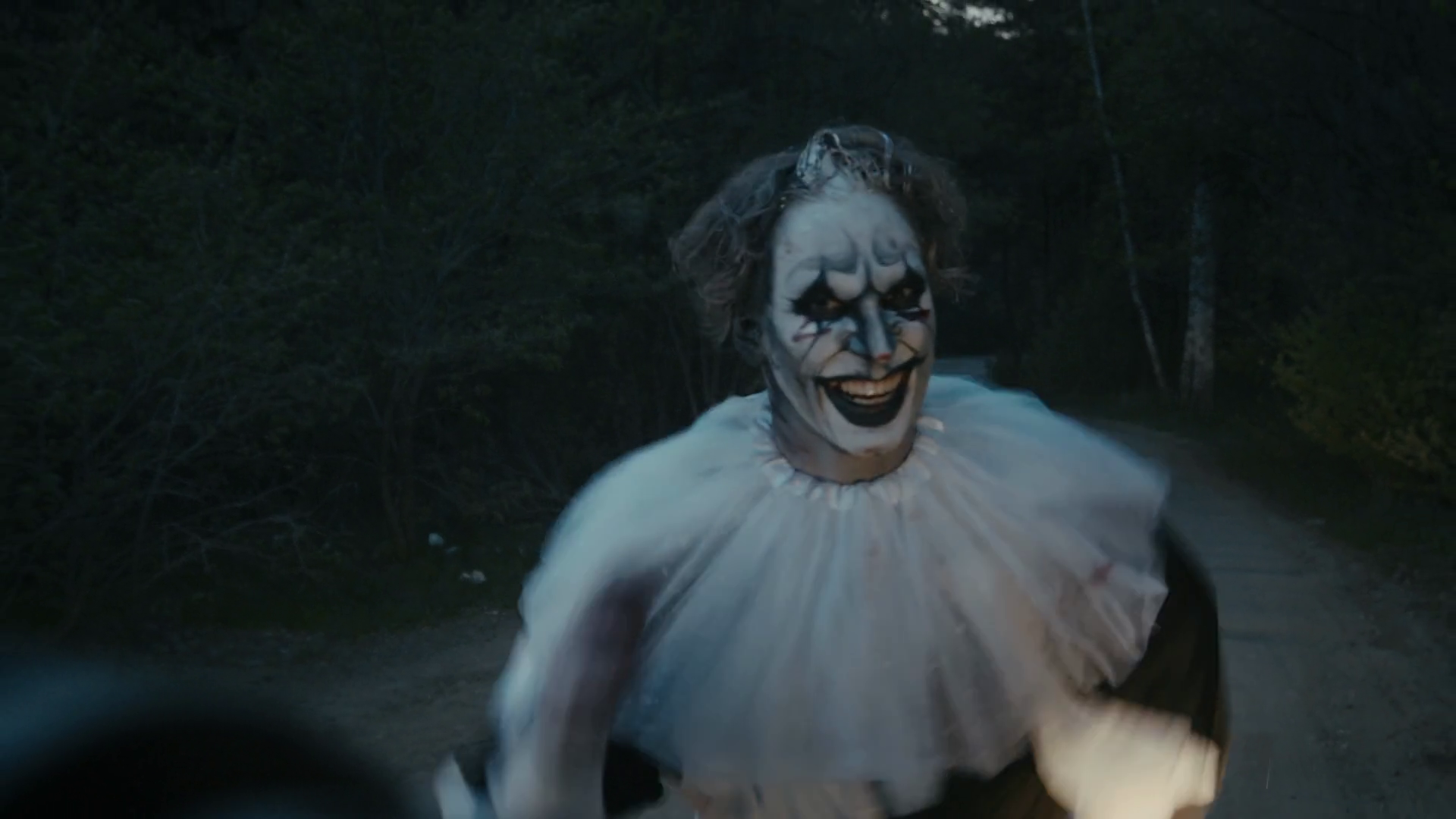 Medium Shot Of Creepy Clown Running Car On Stock Footage SBV-348507252 ...