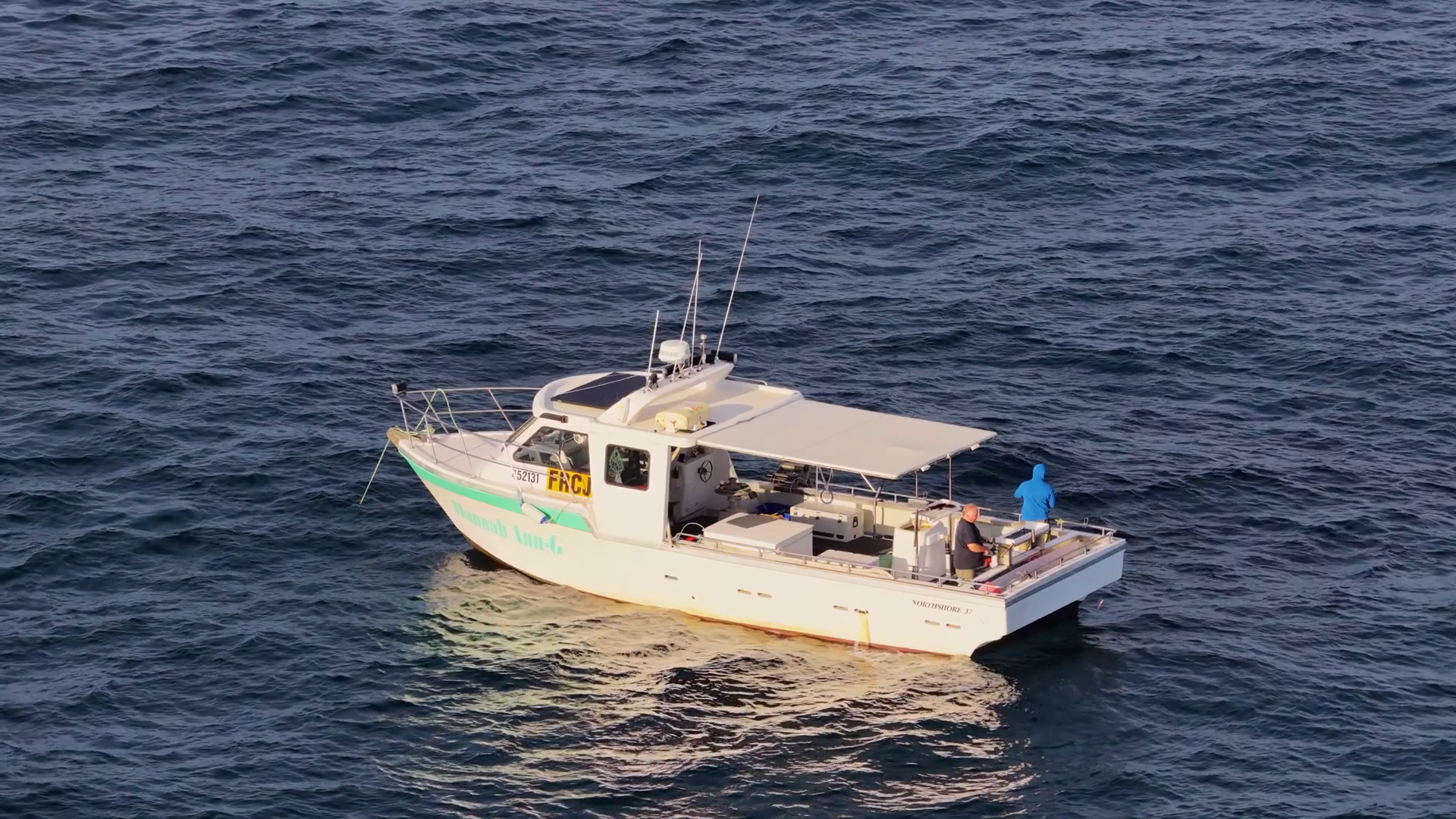Aerial Drone Flyover Of Fishing Charter Boat Stock Footage SBV ...