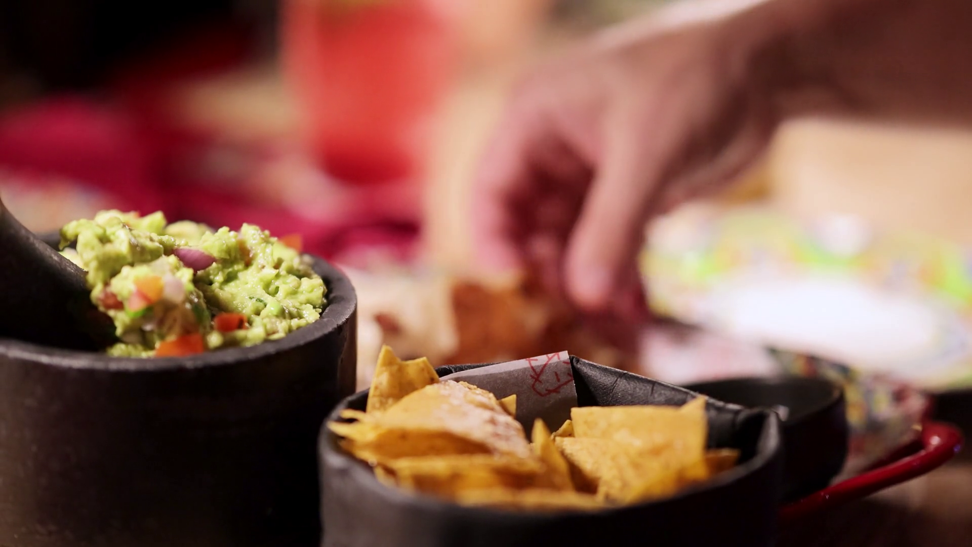 Enjoying Guacamole Chips At Mexican Stock Footage SBV-352424843 ...