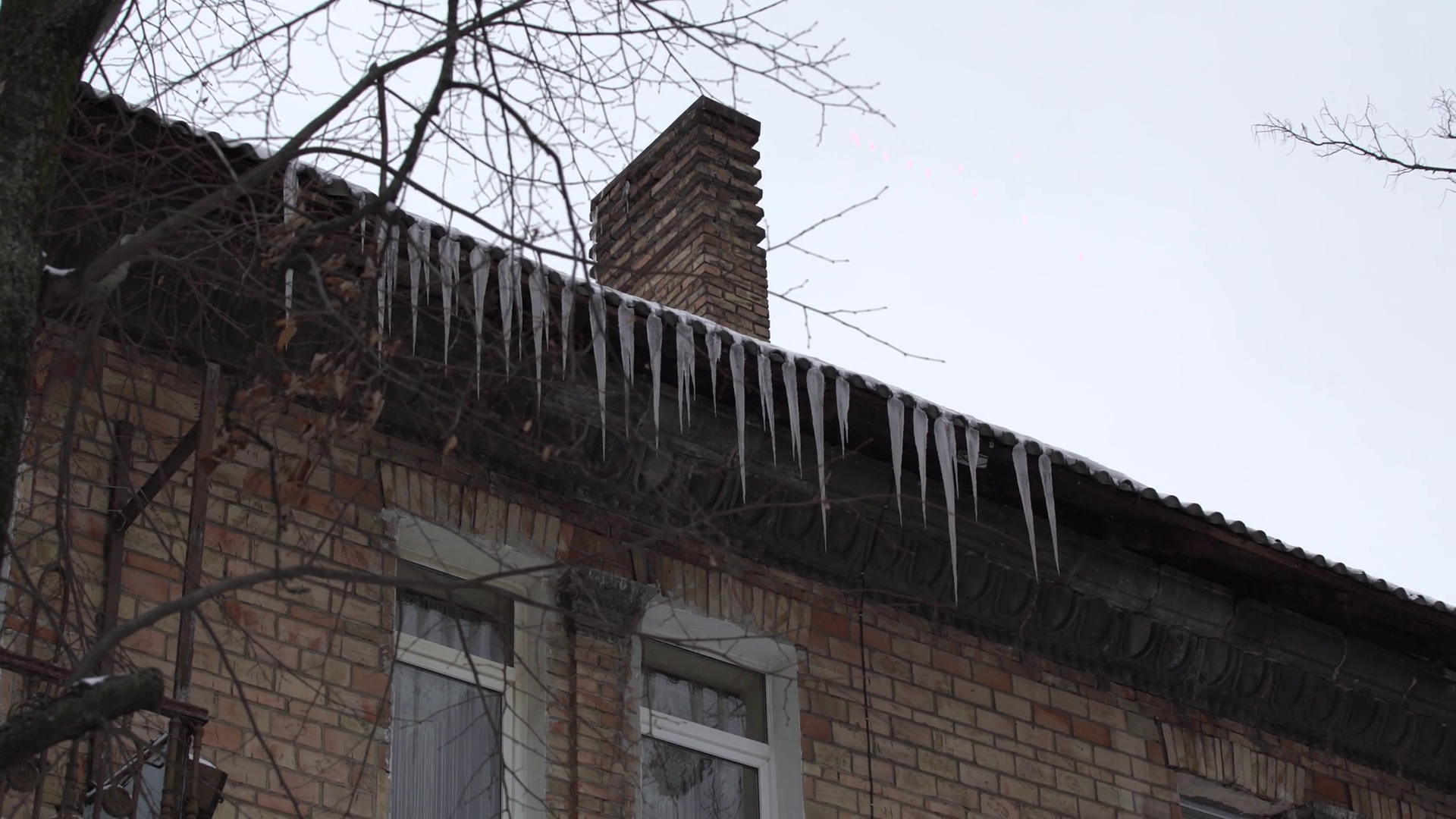 Icicles Forming On Brick House Roof During Stock Footage SBV-351675627 ...