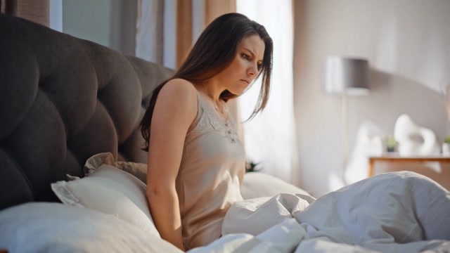 Woman Waking Up Scared Stock Footage: Royalty-Free Video Clips ...