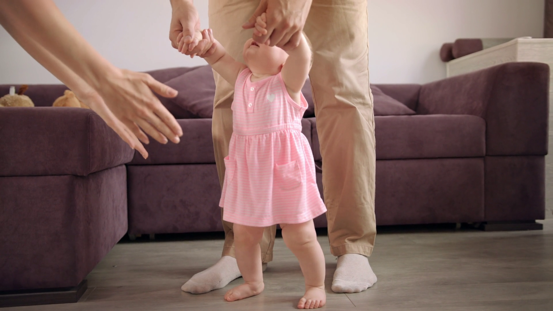 Baby's First Steps: Parents Supporting Stock Footage SBV-323791578 ...