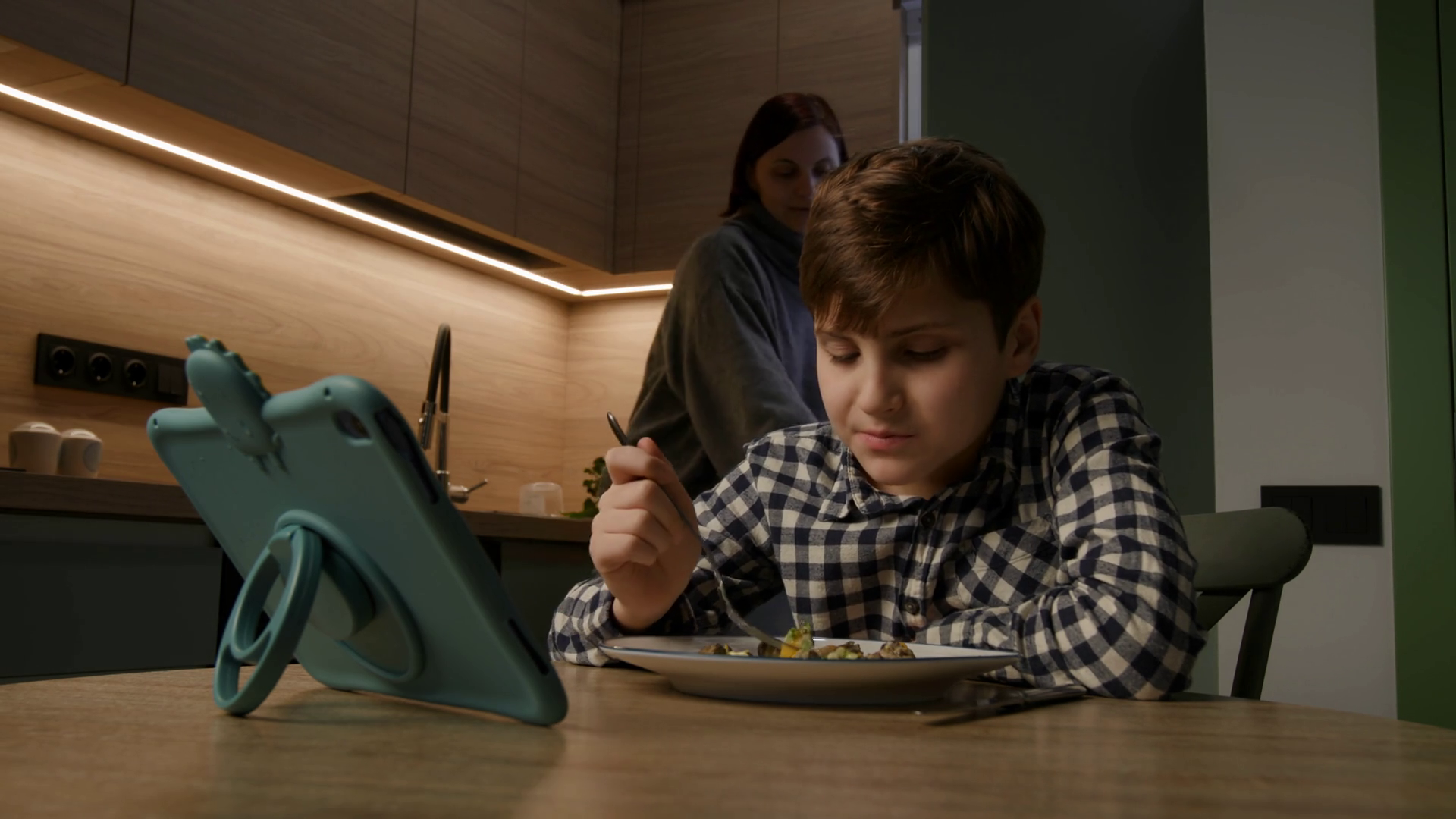 Boy Enjoys Meal Screen Time On Tablet Mom Stock Footage SBV-348885284 ...