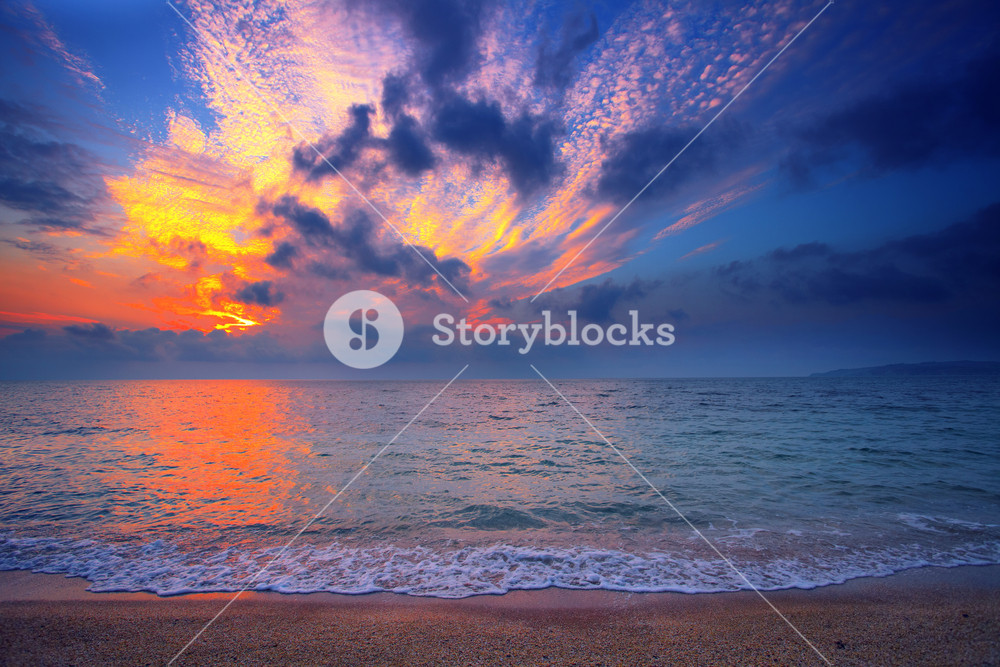 Gorgeous sunrise at the beach Royalty-Free Stock Photo SBI-300875915 ...