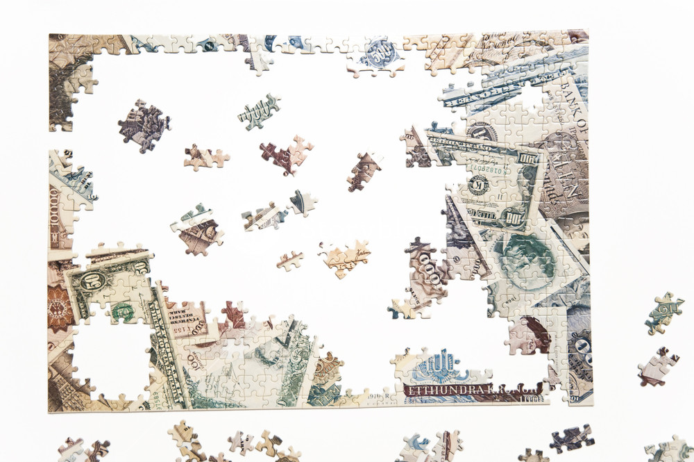 Puzzle Of Money Royalty-Free Stock Photo SBI-300423410 - Storyblocks