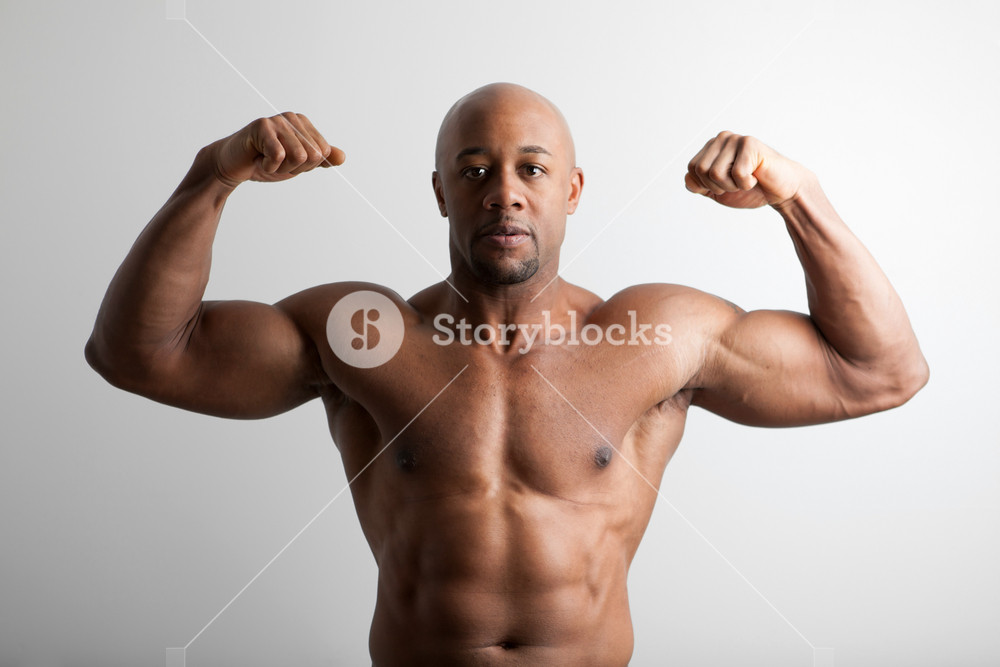 Toned and ripped lean muscle fitness body builder flexing. Royalty-Free ...